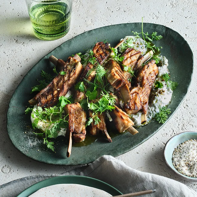 Fennel-spiced lamb ribs recipe with goat's curd tzatziki - Gourmet ...
