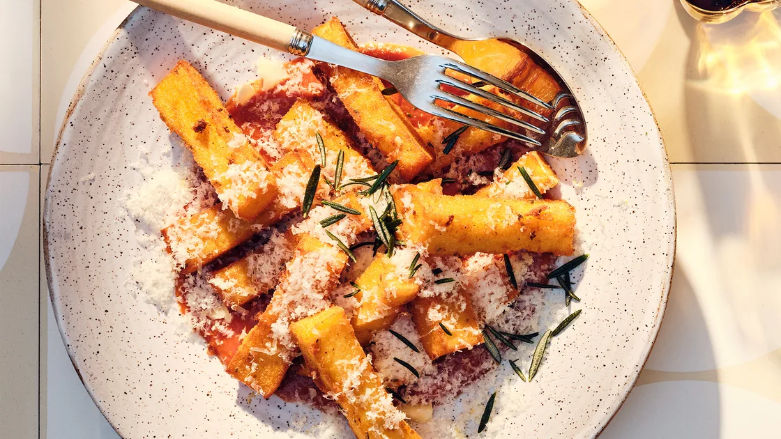 Cheesy polenta chips recipe with bravas sauce - Gourmet Traveller