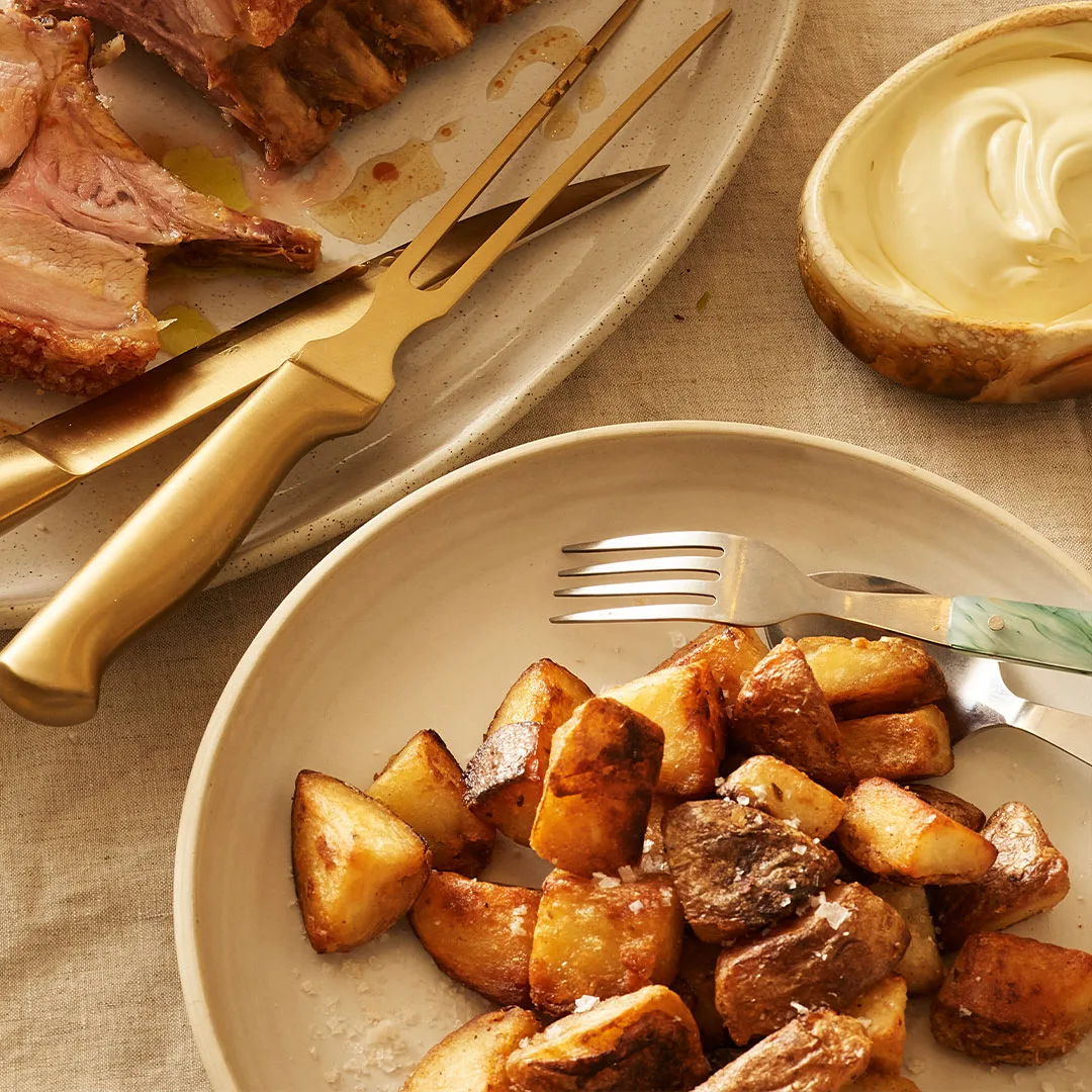 Neil Perry's roast potatoes with whipped crème fraîche - Gourmet Traveller