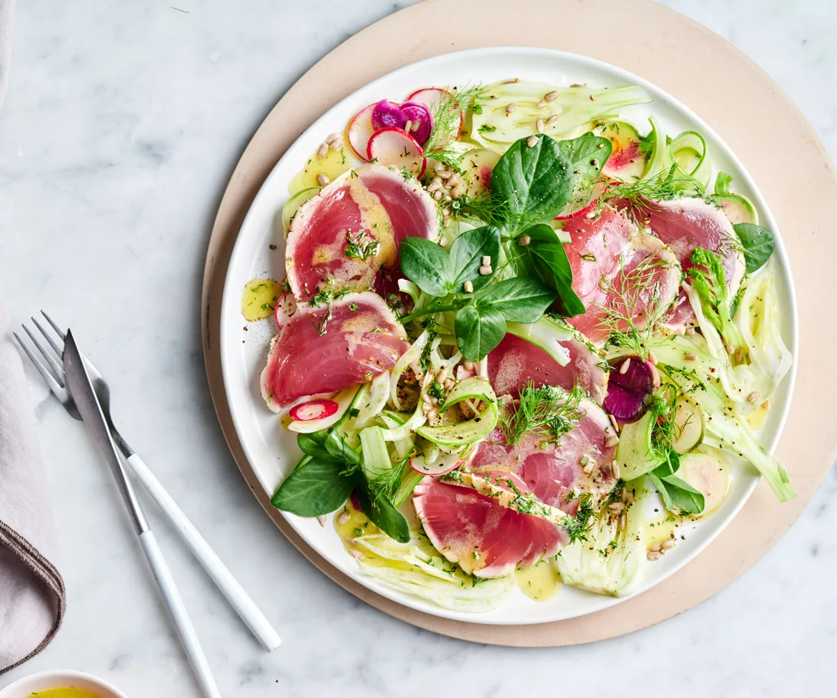 Seared tuna with baby spring greens recipe | Gourmet Traveller