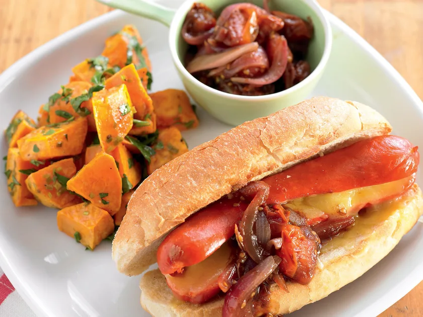 Cheesy hot dogs with kumara salad