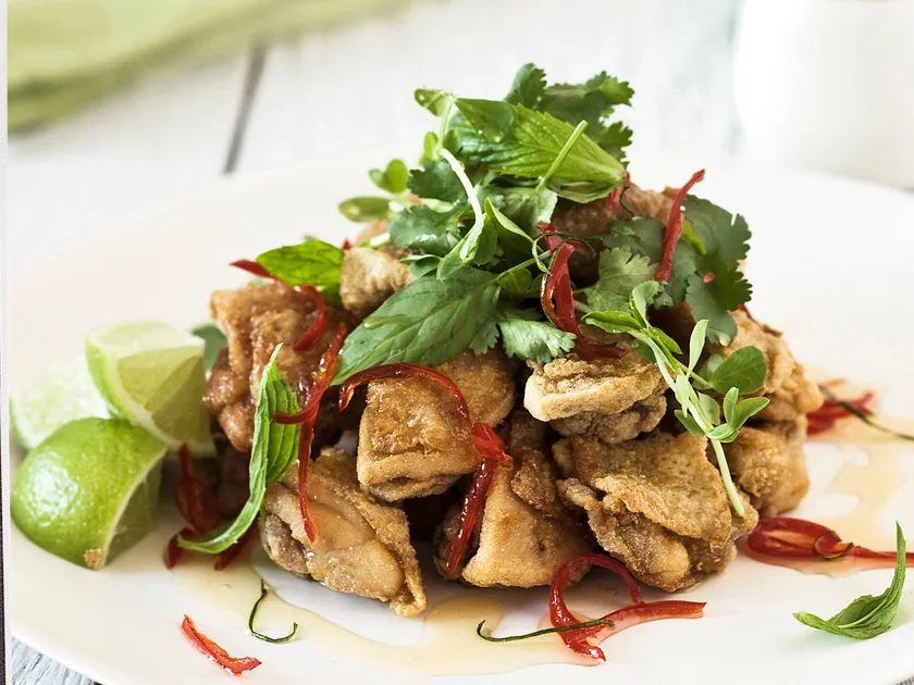 Crispy skin chicken with asian herb salad
