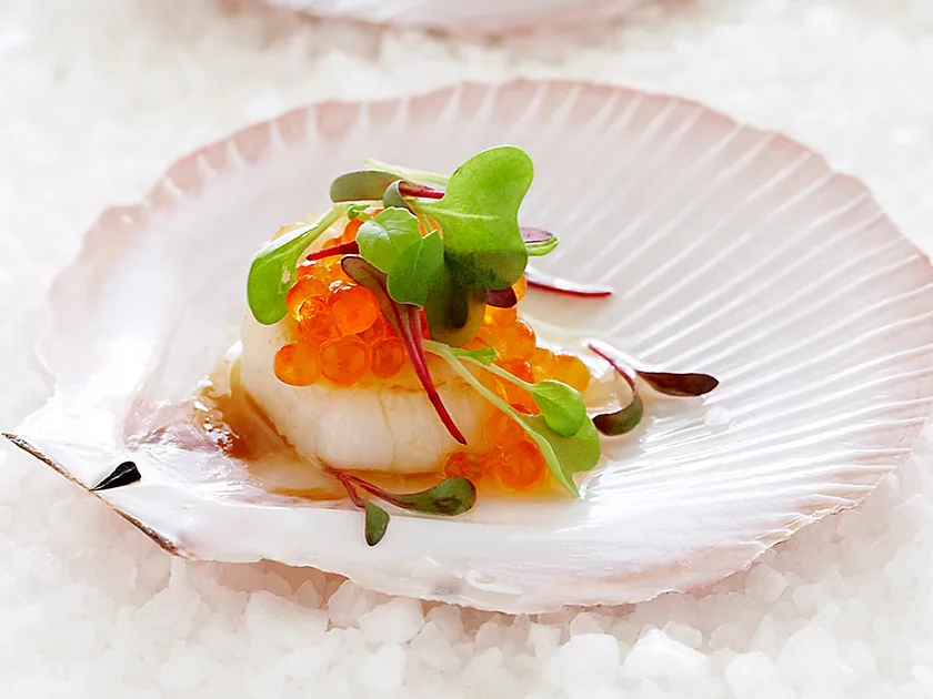 Seared scallops with salmon pearls