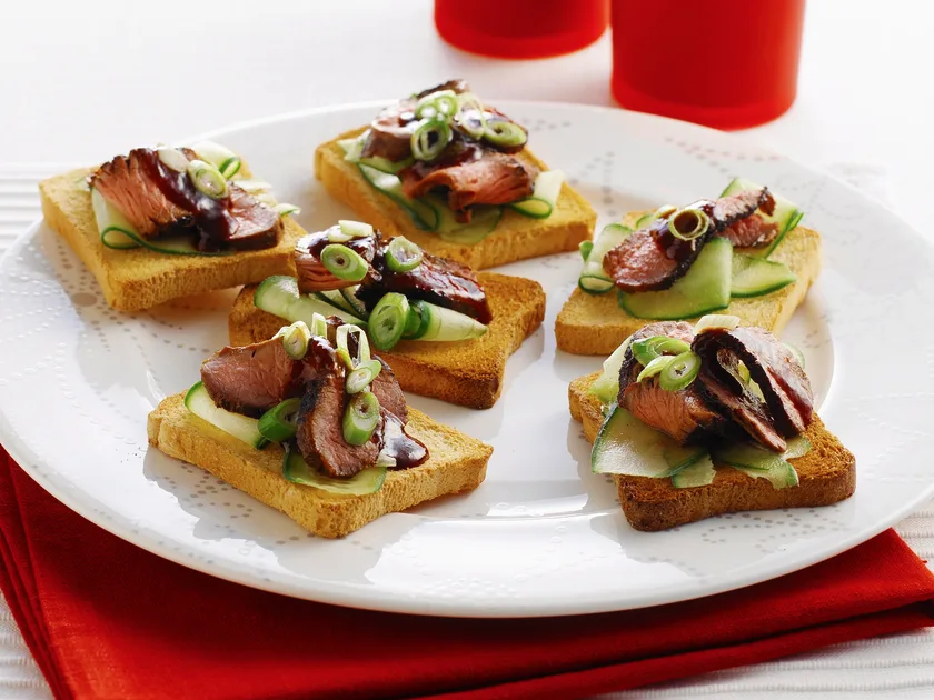 Peking lamb on melba toasts