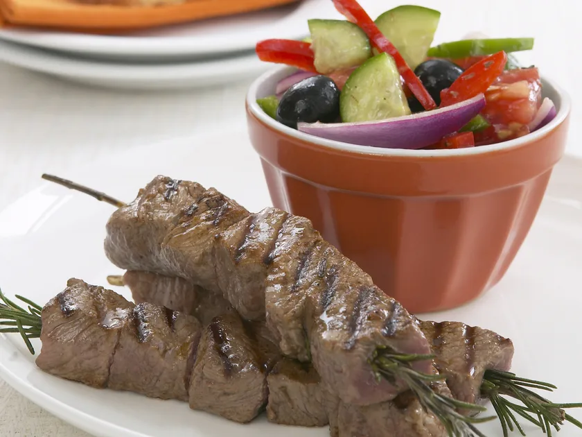 Rosemary kebabs with greek salad