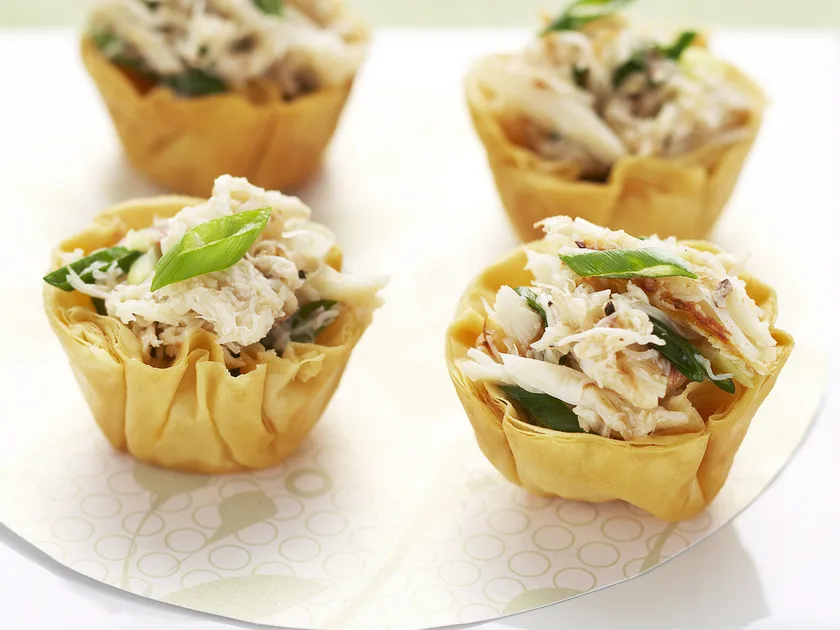 Crab, lime and green onion in mini filo cases