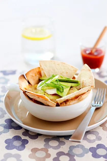 Beef nachos with mashed avocado and tasty cheese recipe