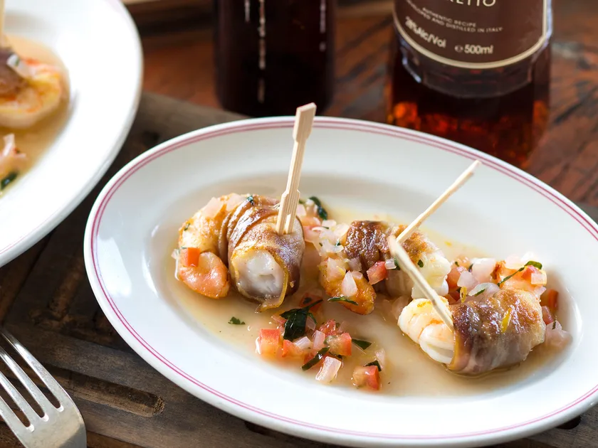 Pancetta prawns with sambuca salsa