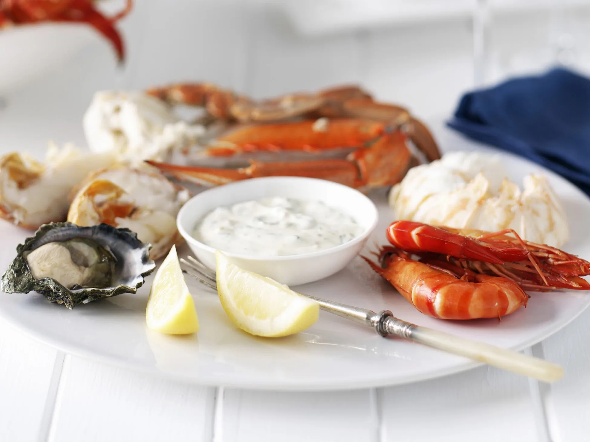 Cold seafood platter with dipping sauces