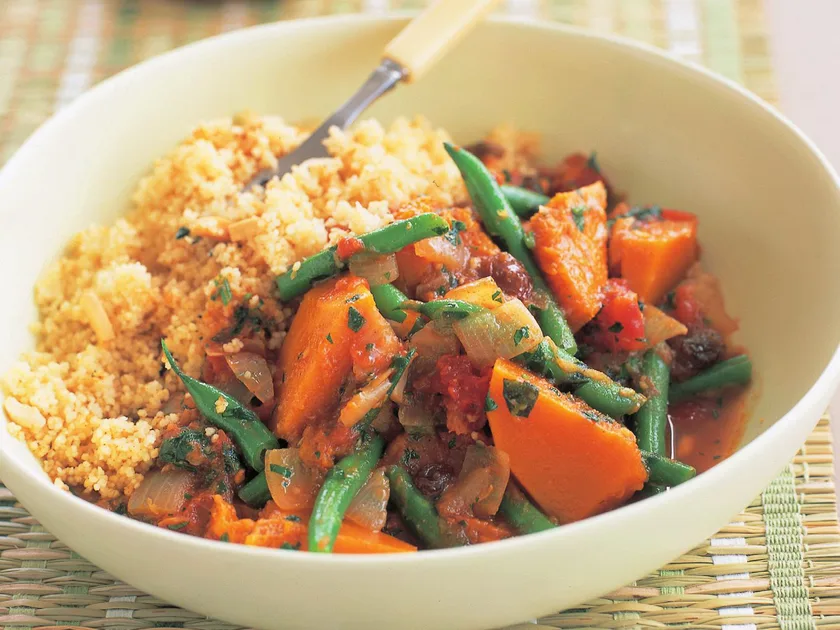 Sweet pumpkin tagine with harissa and almond couscous