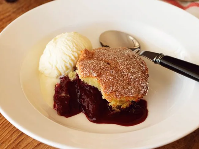 Sponge-topped plum pudding
