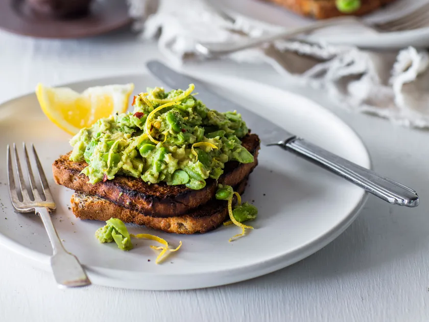 Smashed avocado and edamame on toast