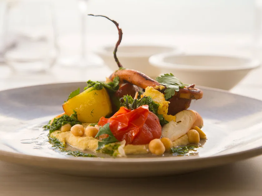 Bazaar Restaurant’s confit octopus with hummus and tomato