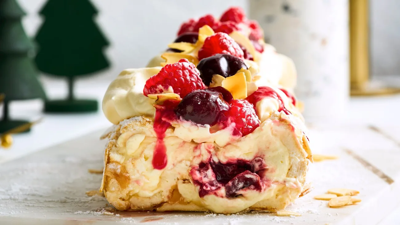 Sour cherry and almond roulade - Better Homes & Gardens Australia
