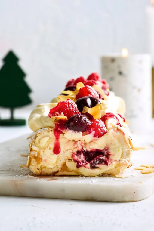 Sour cherry and almond roulade - Better Homes & Gardens Australia