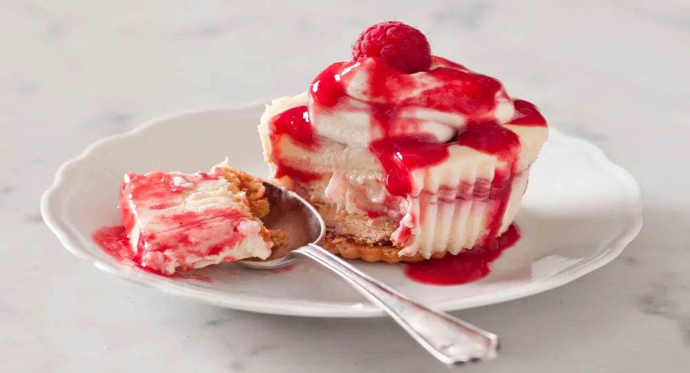White chocolate and raspberry mini cheesecakes - Better Homes & Gardens ...