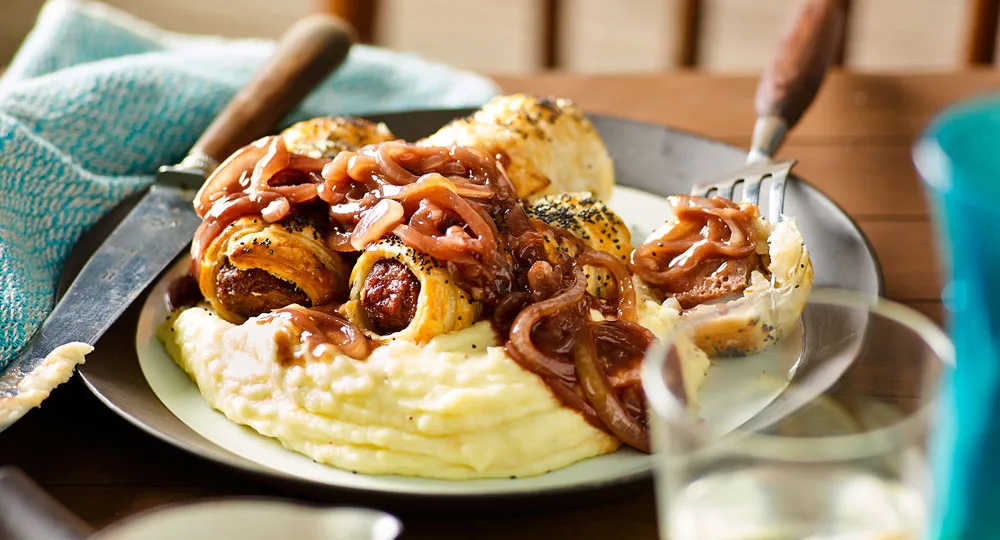 Fancy sausage rolls with mashed potato and onion gravy - Better Homes ...