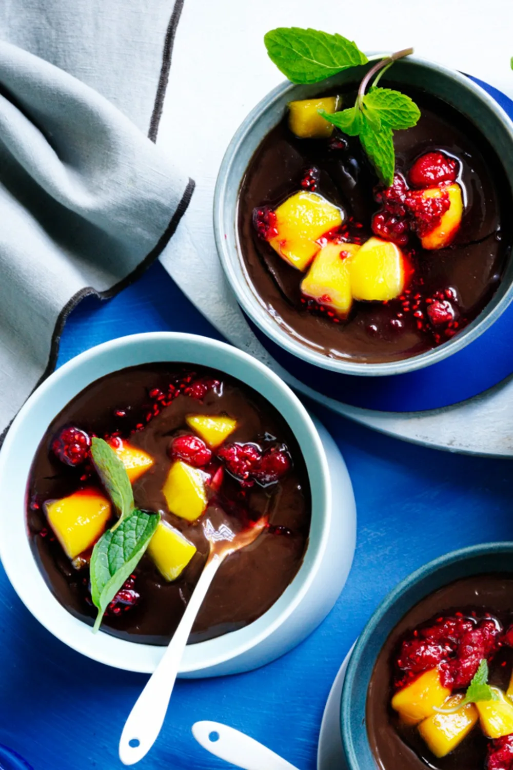 Mocha-Almond Pudding with Mango Sauce Recipe - Better Homes & Gardens ...