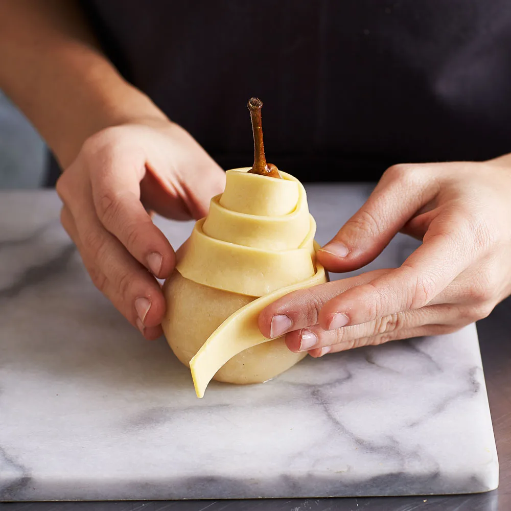 Whole pear pie with chocolate sauce - Better Homes & Gardens Australia