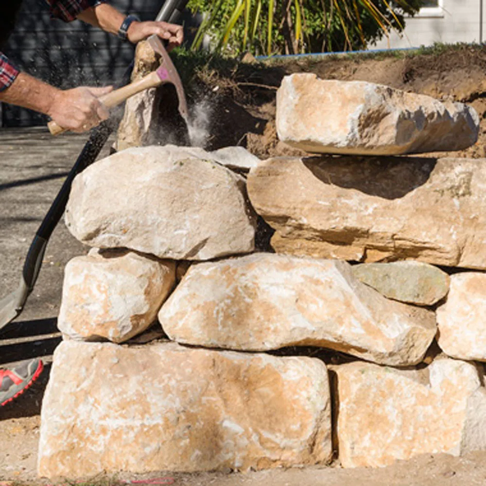 How to build a stacked sandstone wall | Better Homes & Gardens Australia