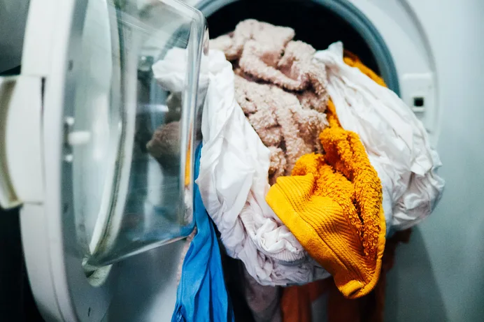 How To Stop Clothes Getting Tangled In The Washing Machine | Better ...