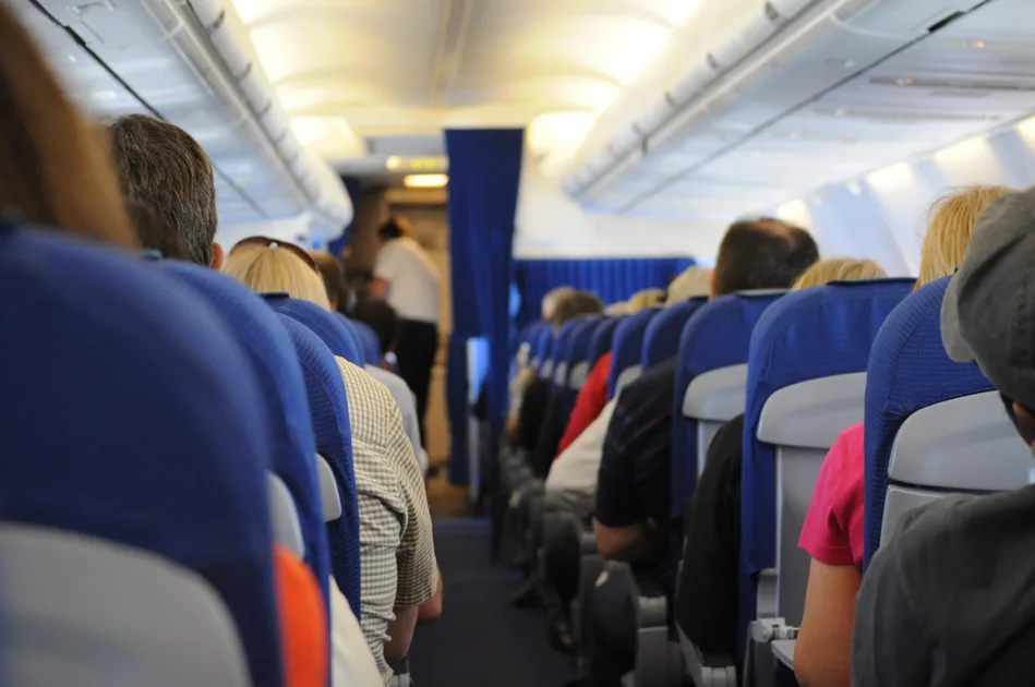 Here's the safest (and best) spot to sit on a plane | Better Homes ...