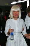 Why Does Sia Cover Her Face? | WHO