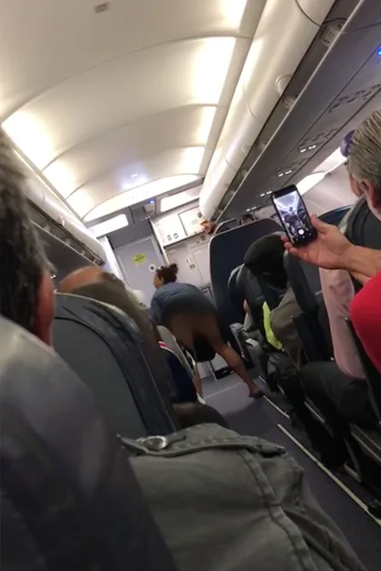 Watch airline passenger FLASHES entire plane while twerking during a ...