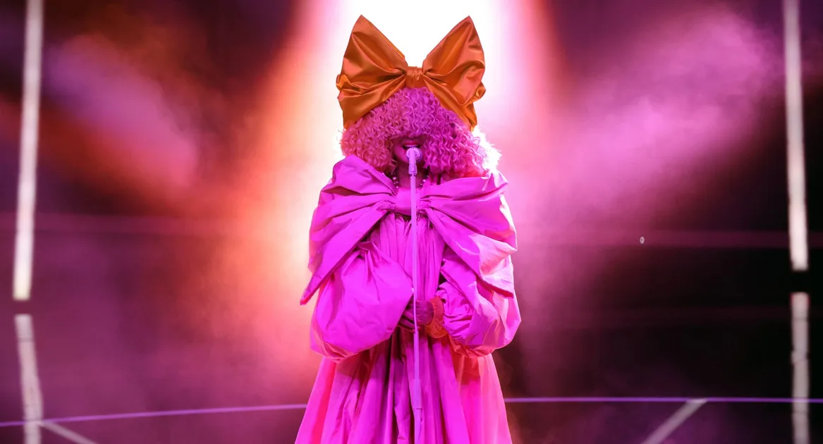 Why Does Sia Cover Her Face? | WHO