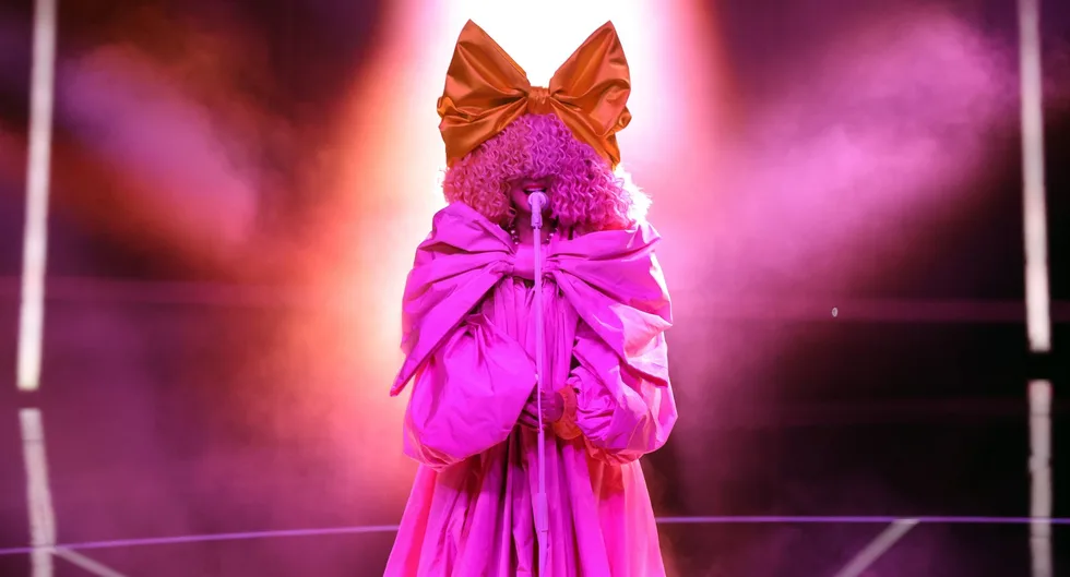 Why Does Sia Cover Her Face? | WHO