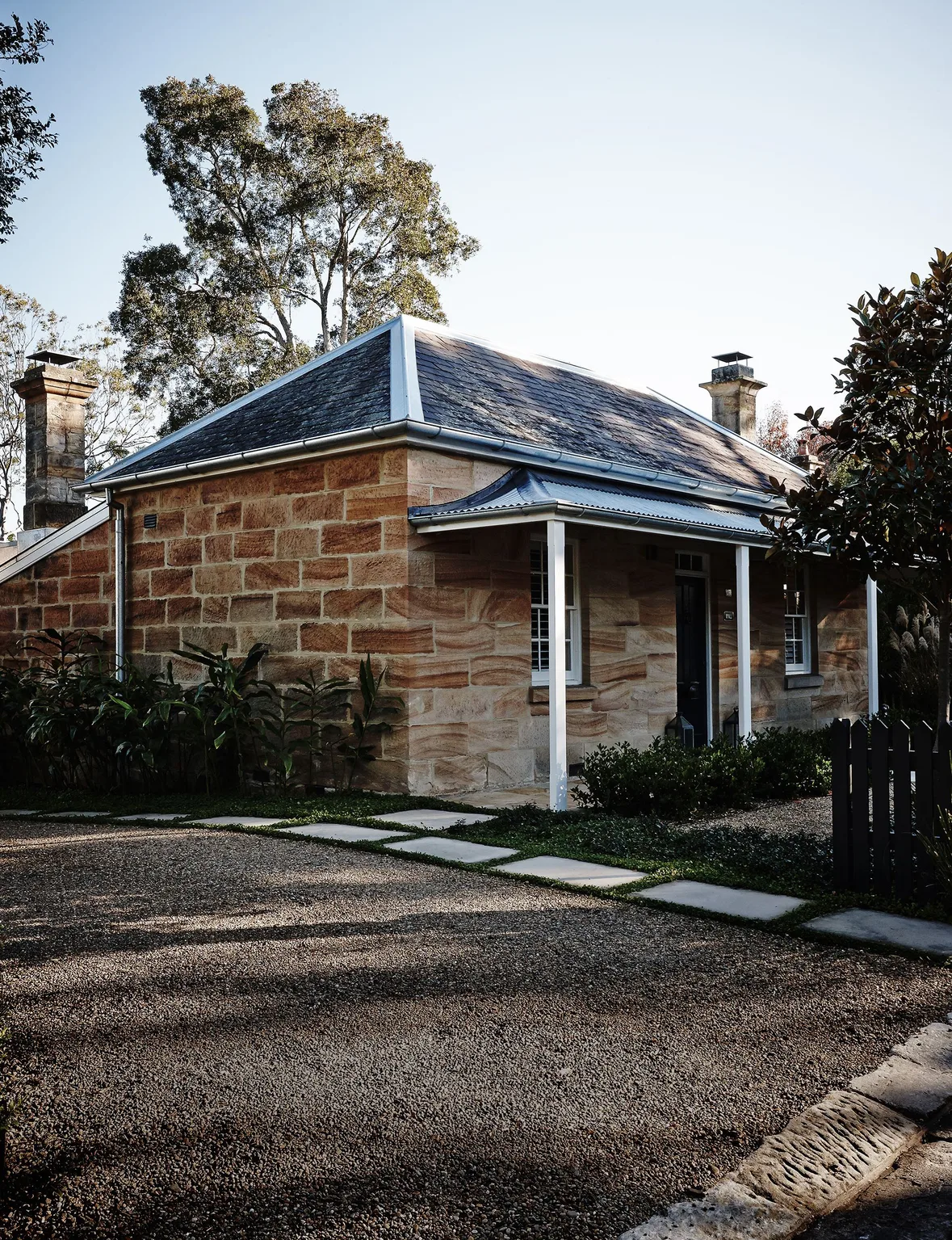 This sandstone cottage has a rather surprising modern addition