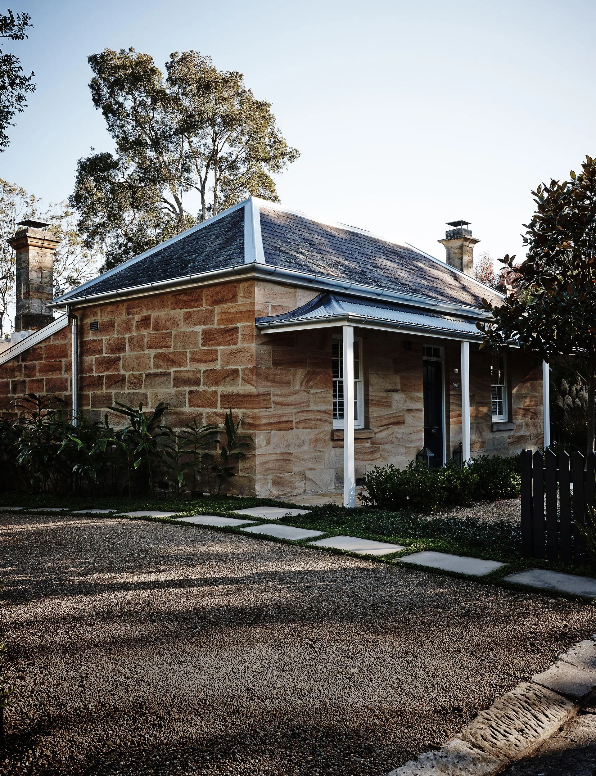 This sandstone cottage has a rather surprising modern addition