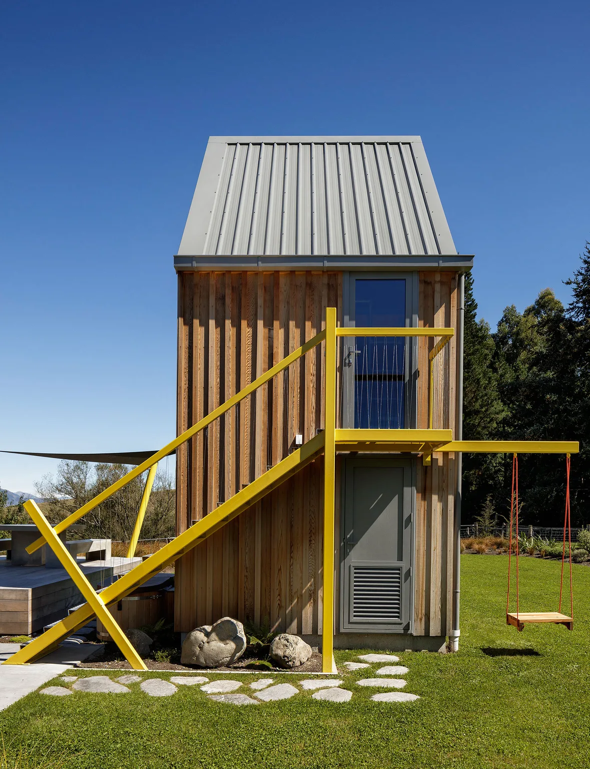 5 New Zealand baches that do summer living in style