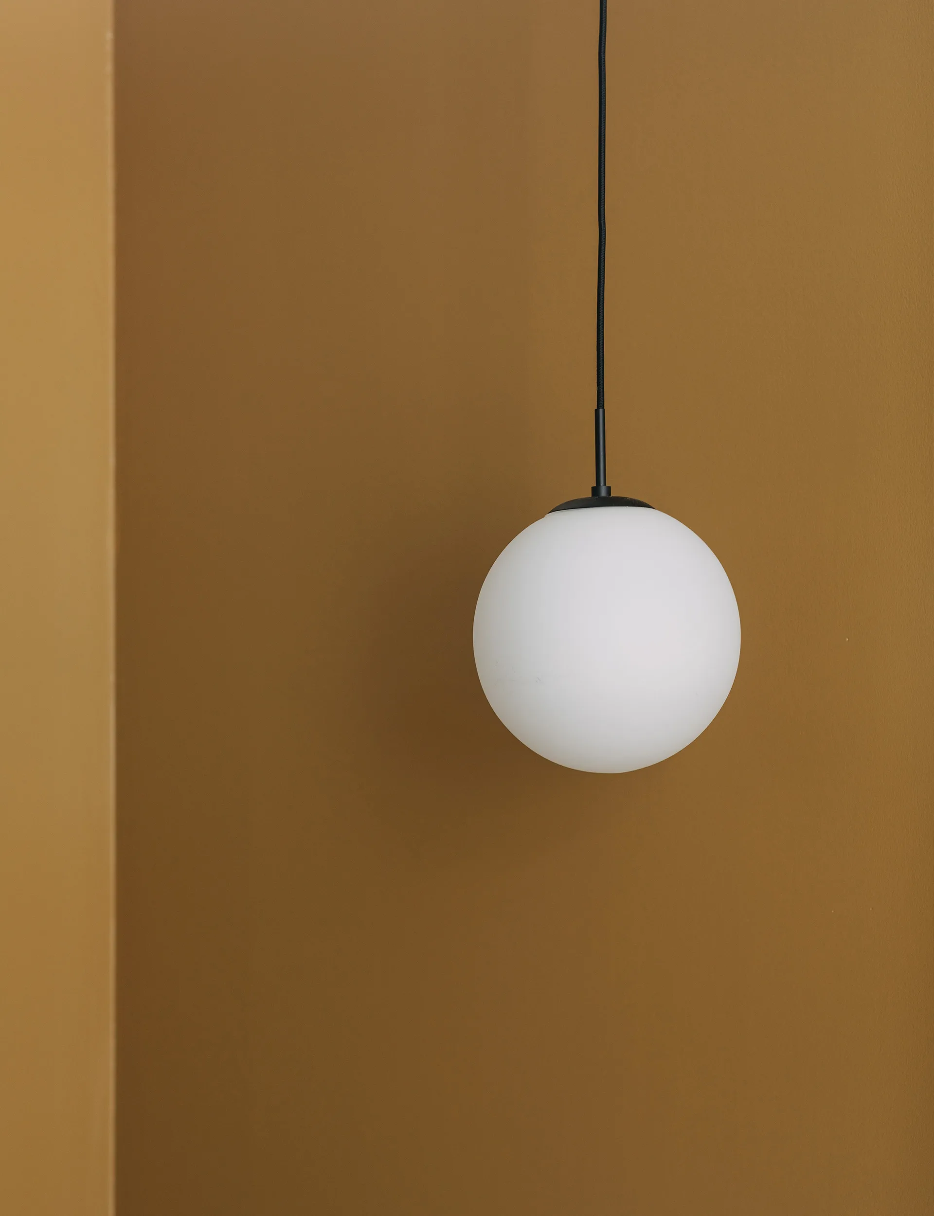 Alex Walls shows us why browns and caramel are perfect for the bedroom