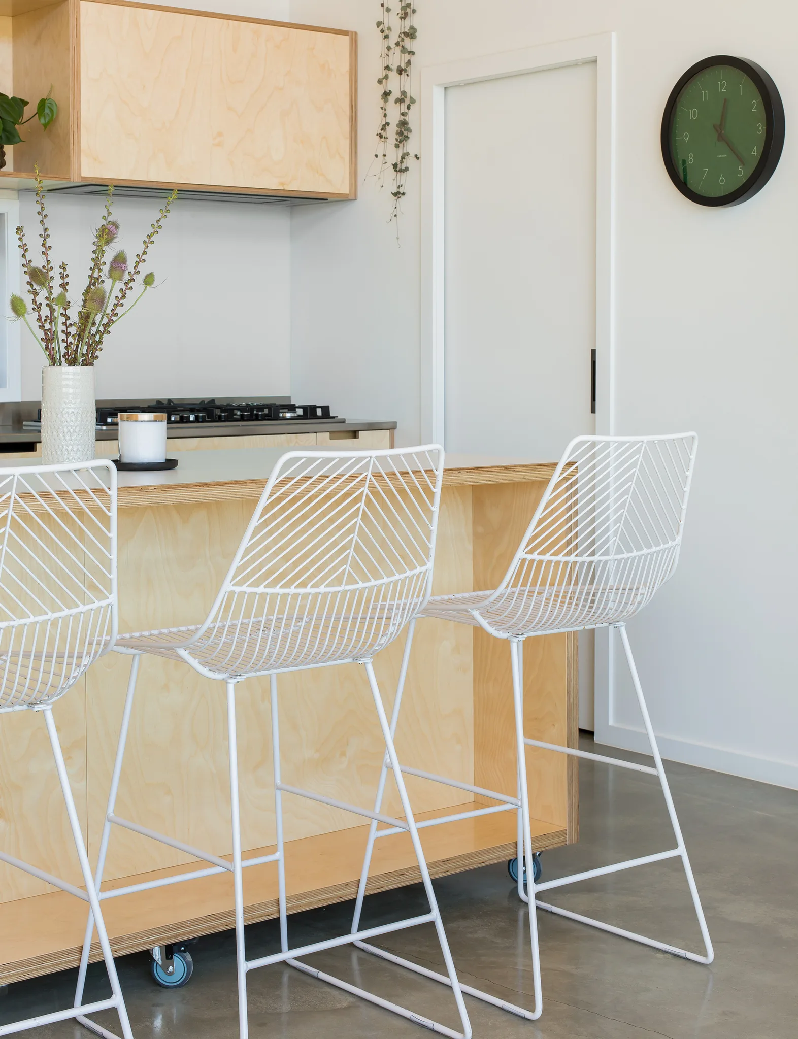This modern kitchen utilises hard-wearing materials in the most stylish way