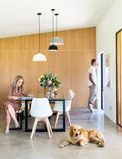 How concrete, metal and timber is warm and welcoming in this chic home