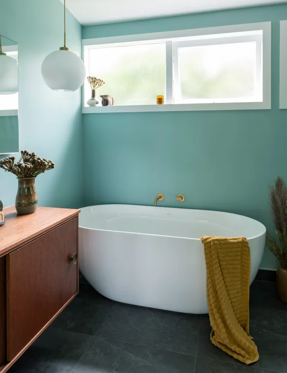 Kristina Rapley's stylish renovation will make you want a blue bathroom