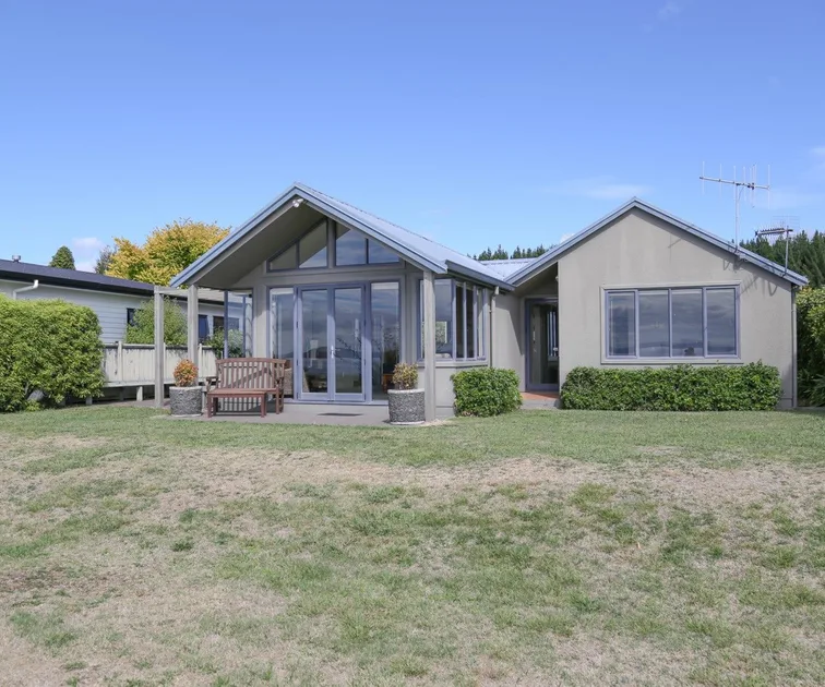 This Waitetoko home for sale offers lakeside living at its best