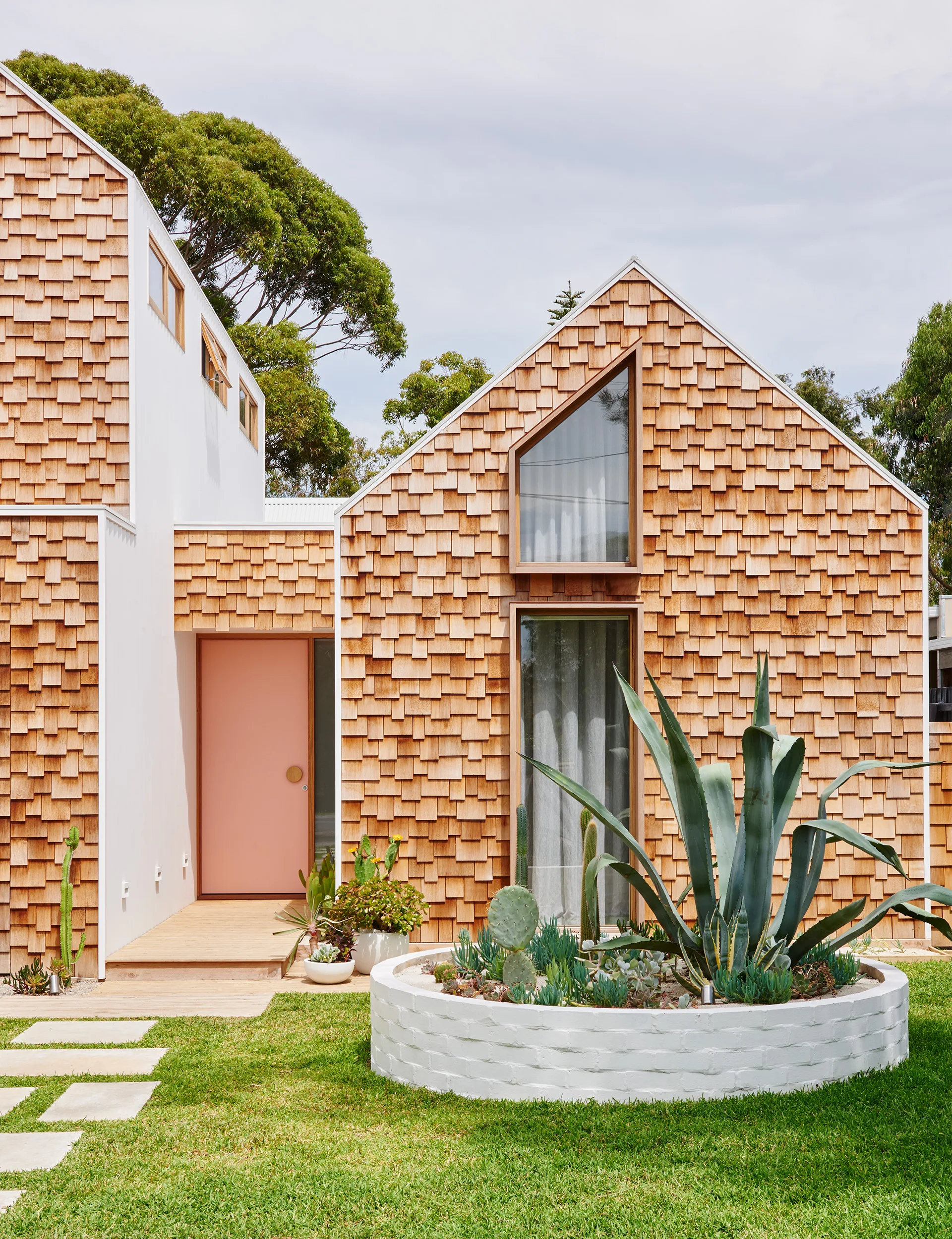 You'll want a mint green bathroom after seeing this pastel coloured home