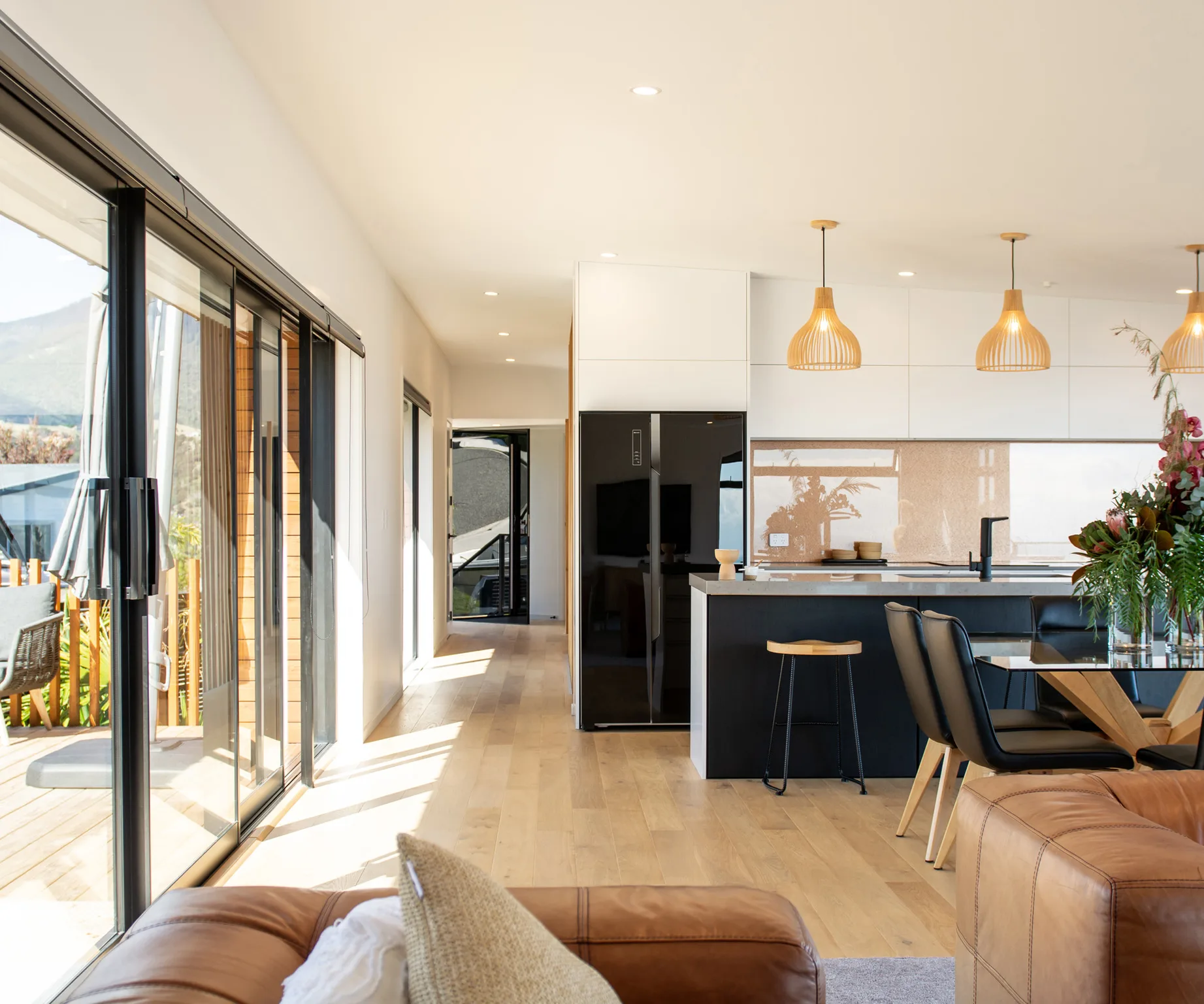 This beautiful Nelson home has 3 decks to capture all-day sun