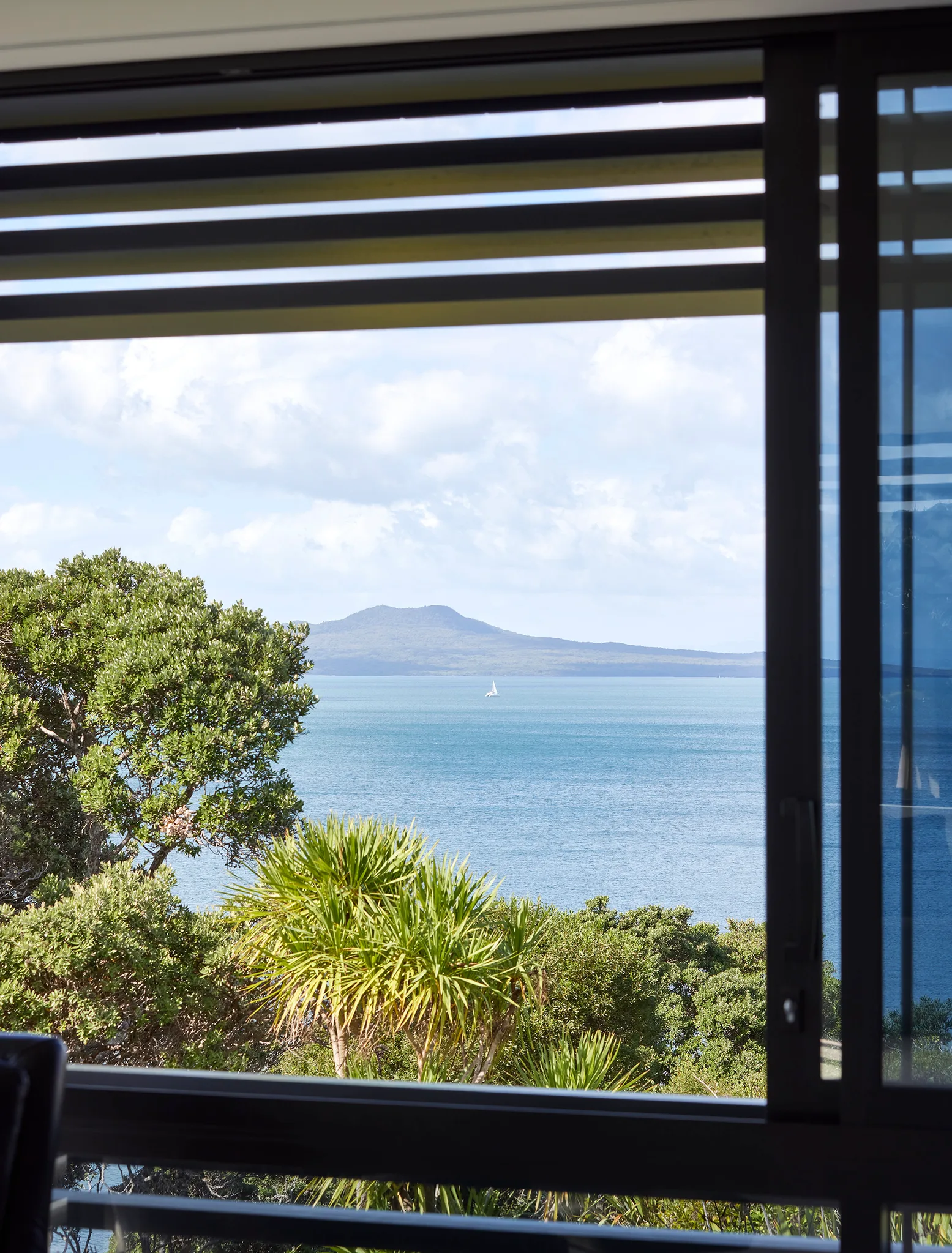 This Auckland clifftop stunner is the ultimate in indoor-outdoor flow ...