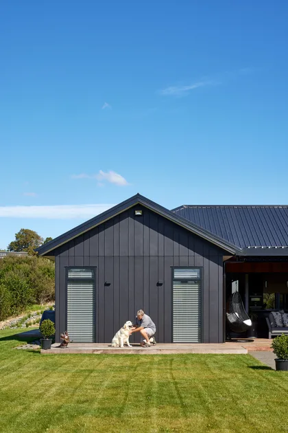 See inside this stunning black-clad home with seamless indoor-outdoor ...