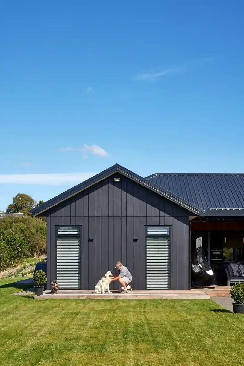 See inside this stunning black-clad home with seamless indoor-outdoor ...