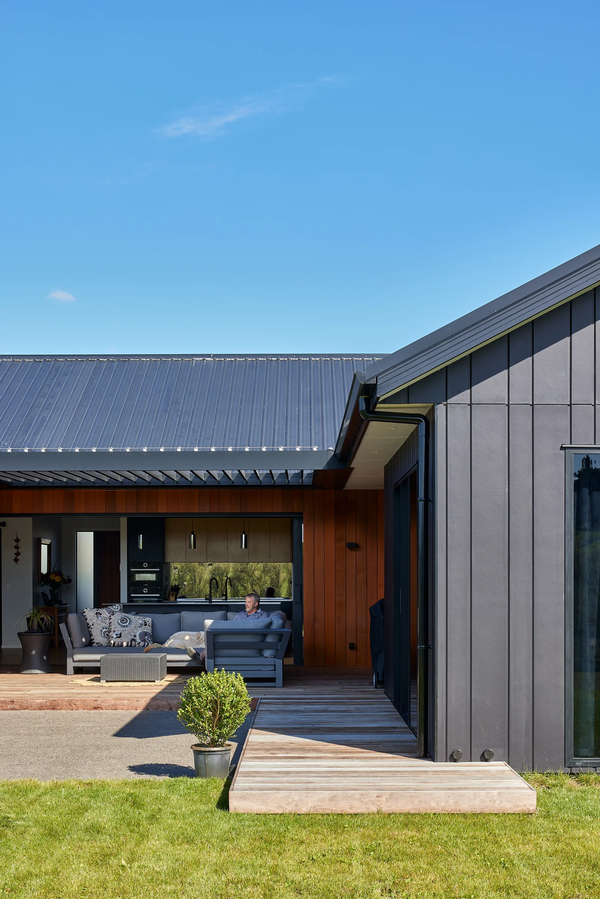 See inside this stunning black-clad home with seamless indoor-outdoor ...