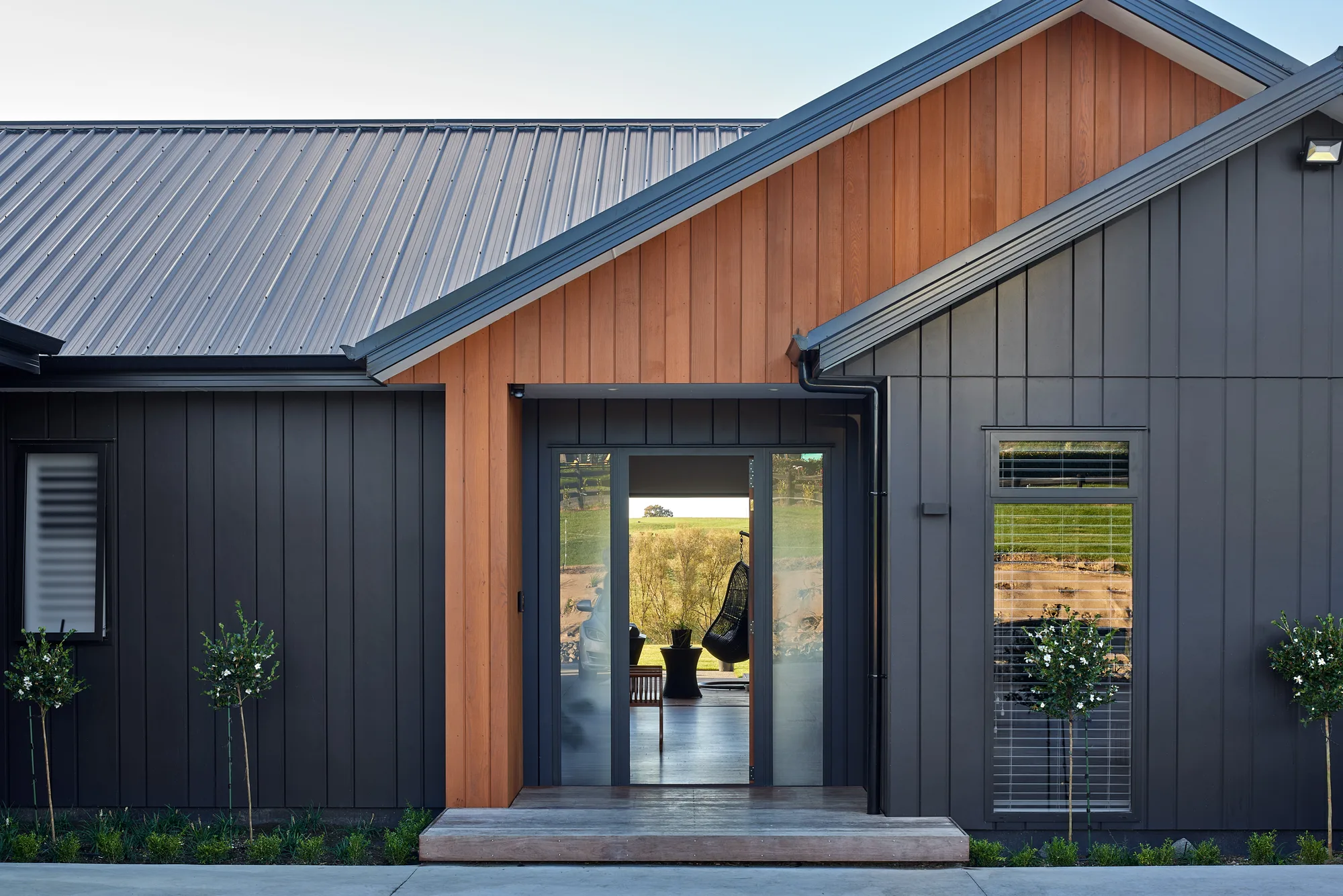 See inside this stunning black-clad home with seamless indoor-outdoor ...