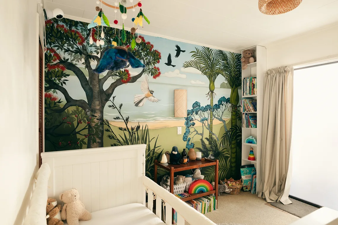 Native flora and fauna feature in this nursery mural