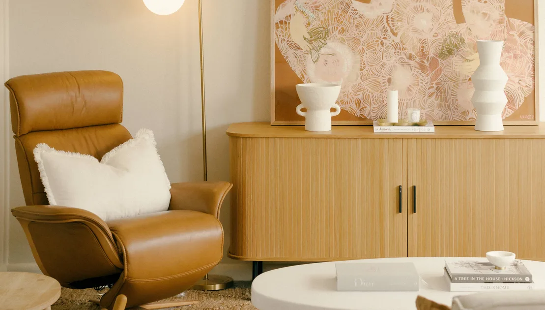 A young family takes pride in their coastal Māpua rental home