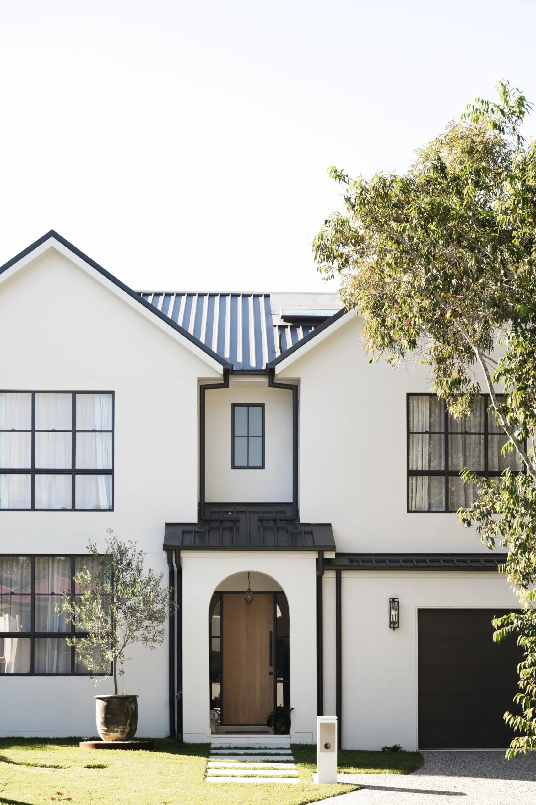 Spanish Mission-style finds a home in Brisbane with this new build ...