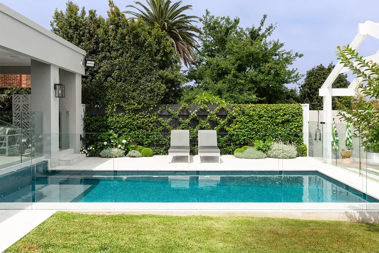 Garden reimagined as a poolside oasis