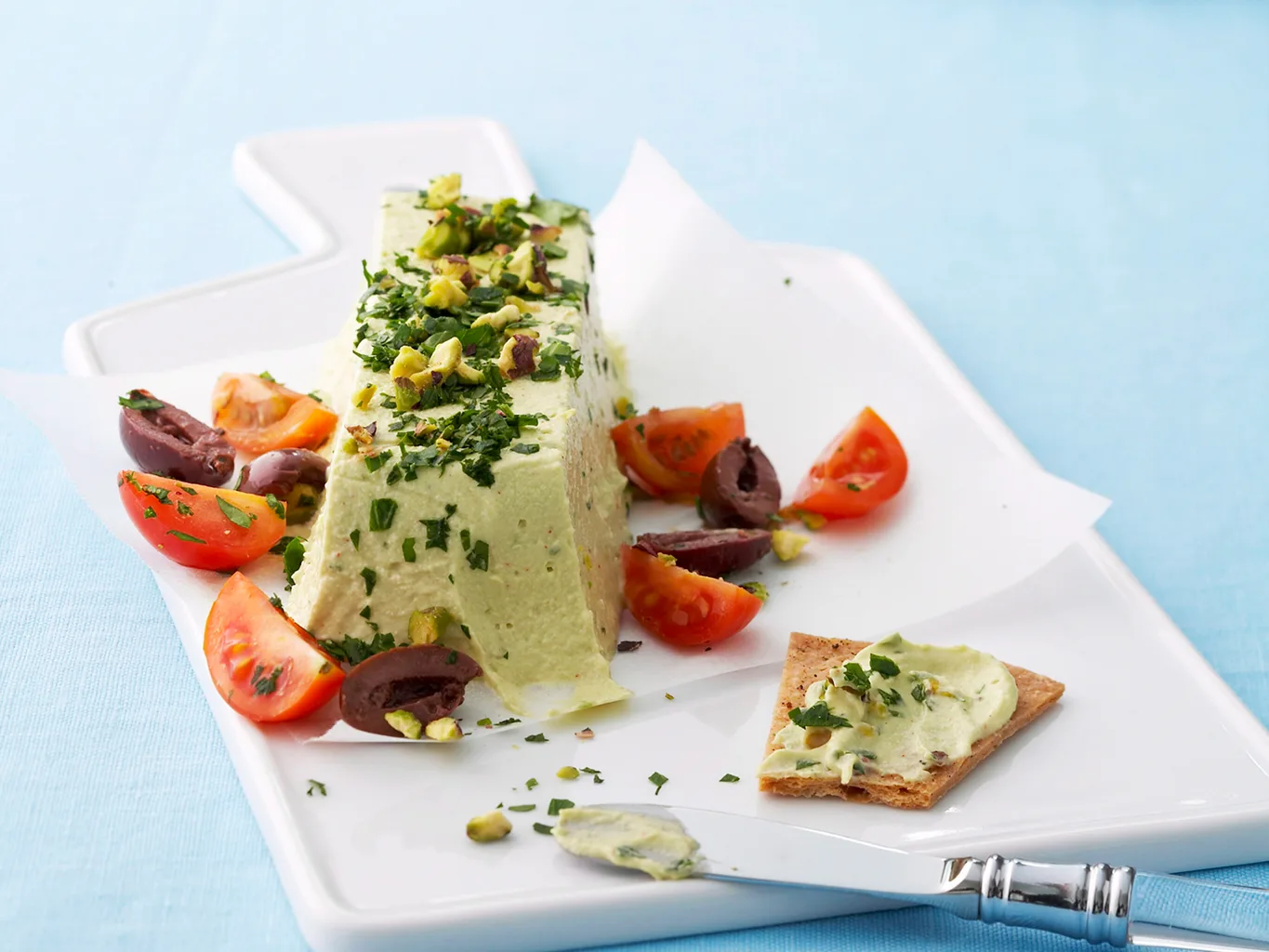 Avocado pate with parsley and pistachios